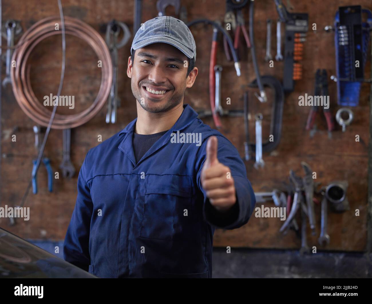 Ive got everything I need to service your vehicle. Cropped portrait of ...