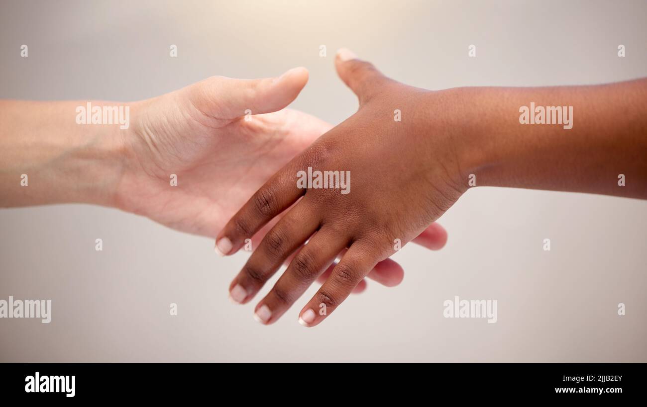 Reaching out to loved ones. two people reaching for one another Stock ...