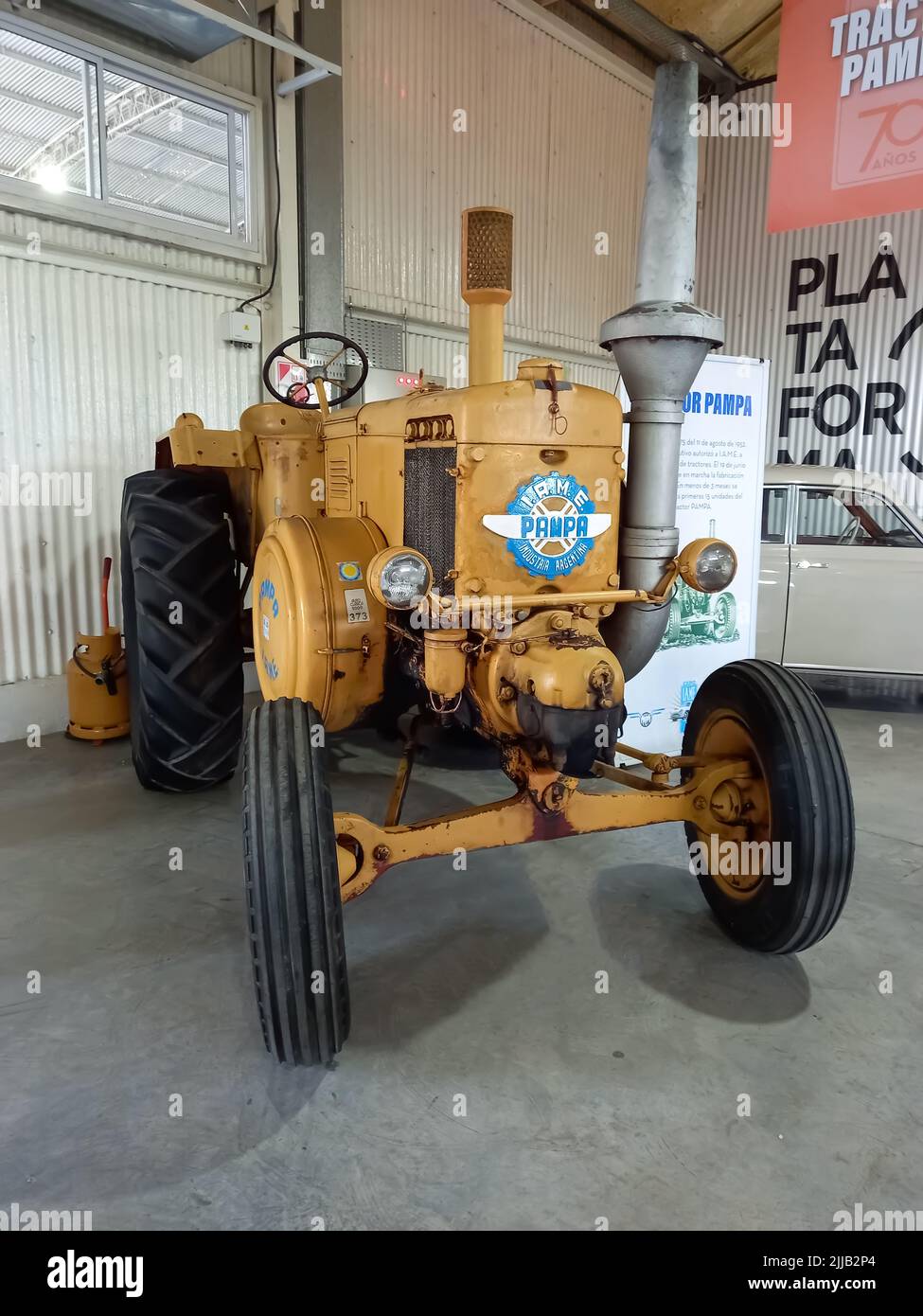 Old yellow IAME Pampa agricultural tractor 1950s, Argentine version of ...
