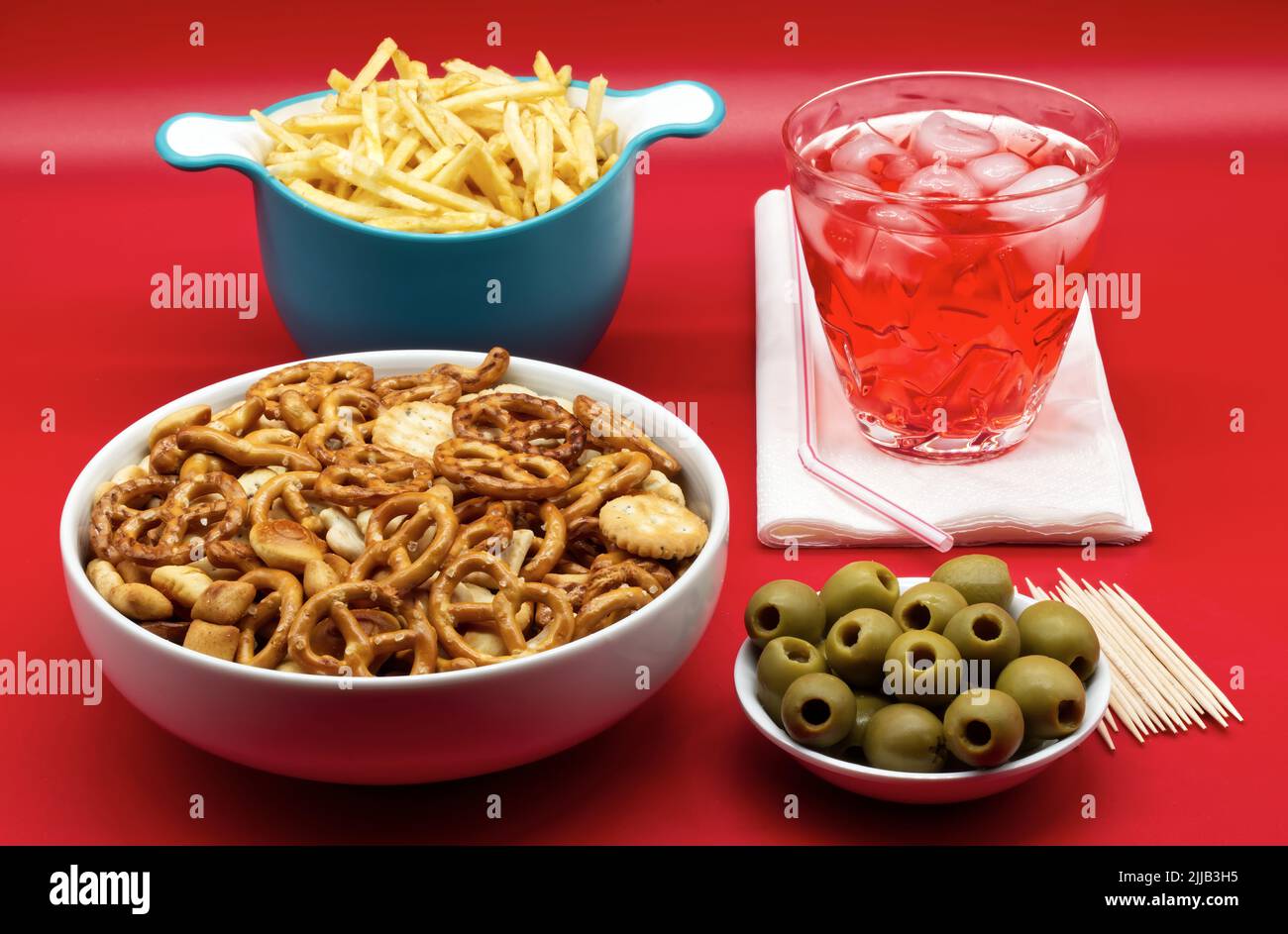 Italian aperitive: glass of frozen cocktail with green pitted olives ...