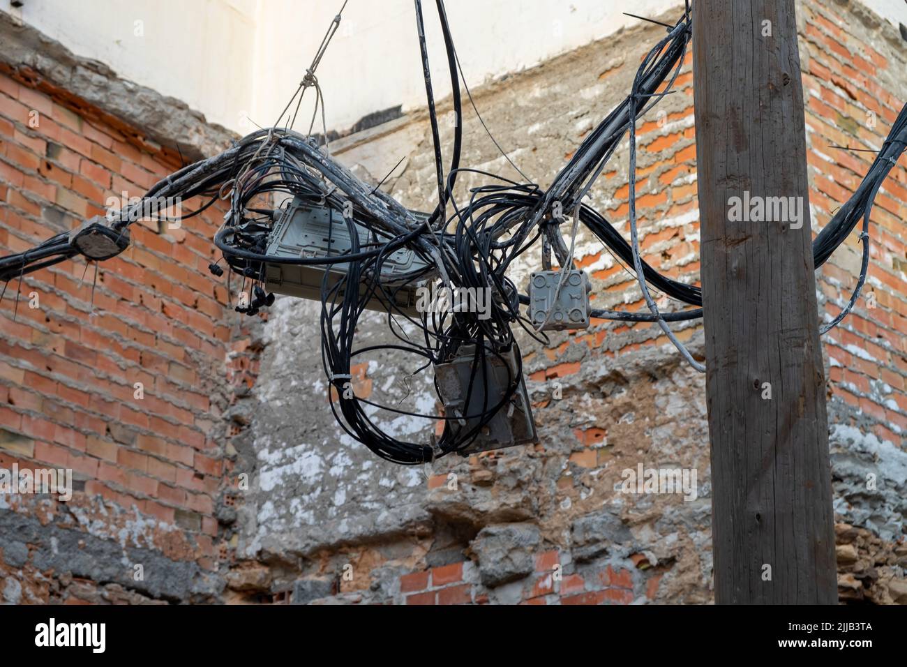 The chaos of cables and wires in a building that is being renovated ...