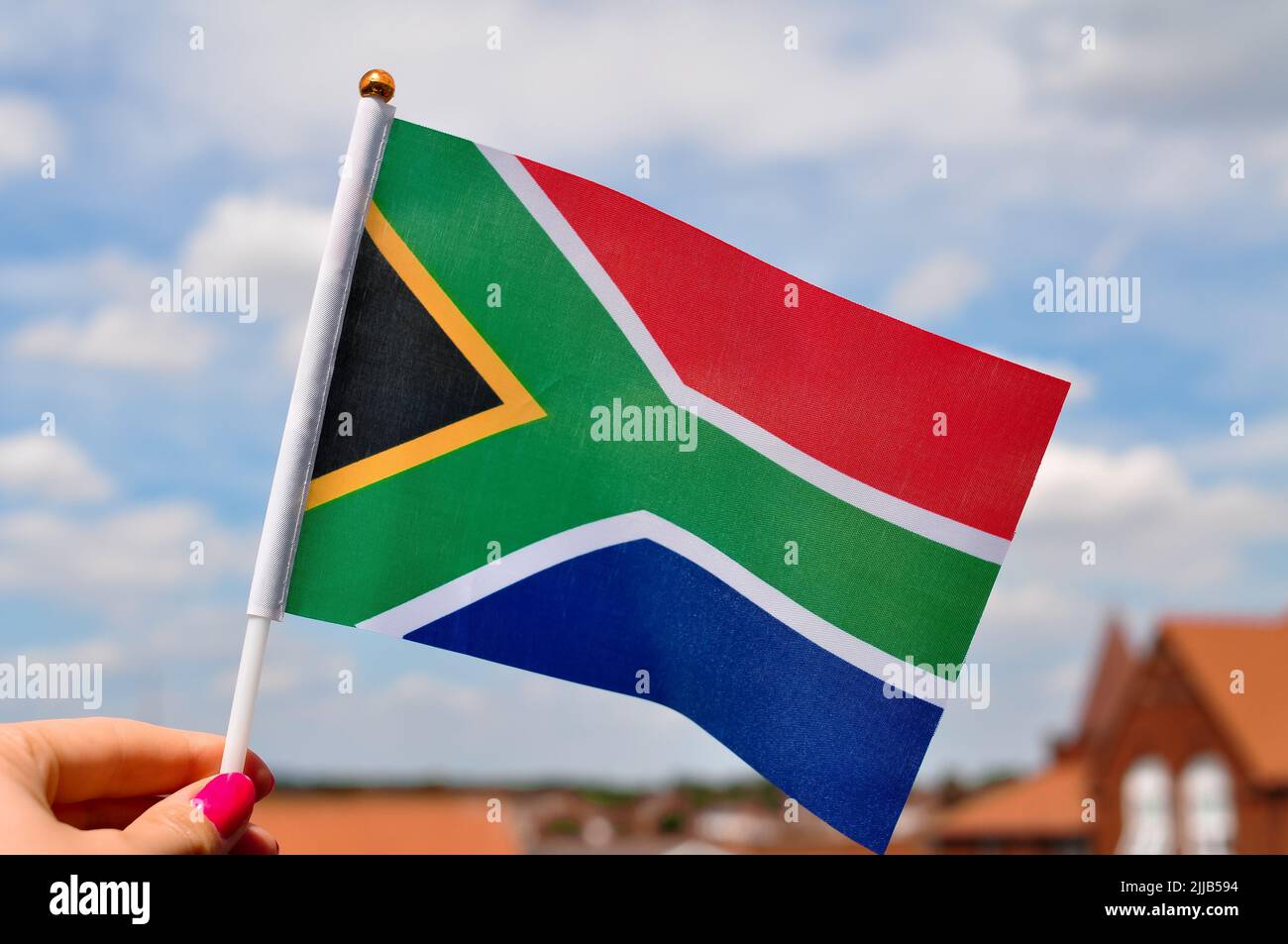 close up of national flag of south africa,red green and blue colors ...