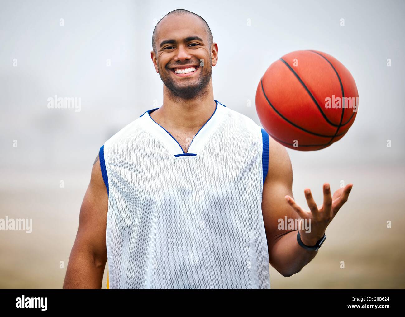 You ball. Cropped portrait of a handsome young male basketball player ...