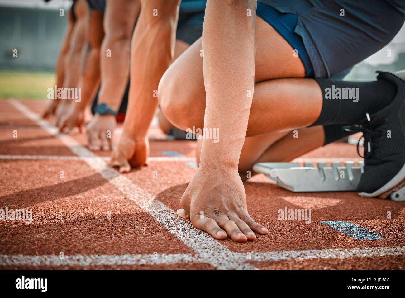 Its not just about how you start... three unrecognizable male athletes ...