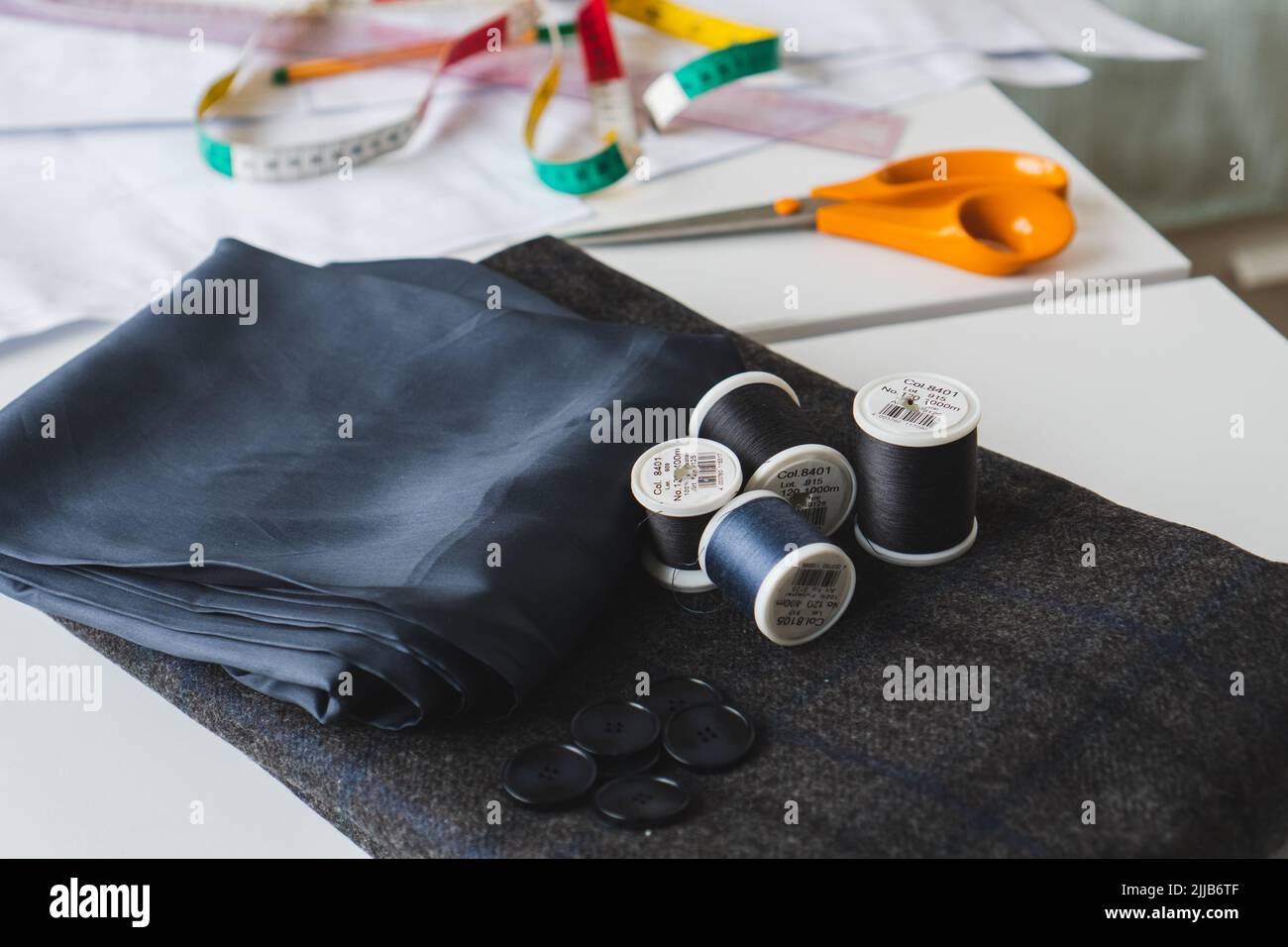 Sewing items and seamstress tools. Tailoring scissors, measuring tape ...