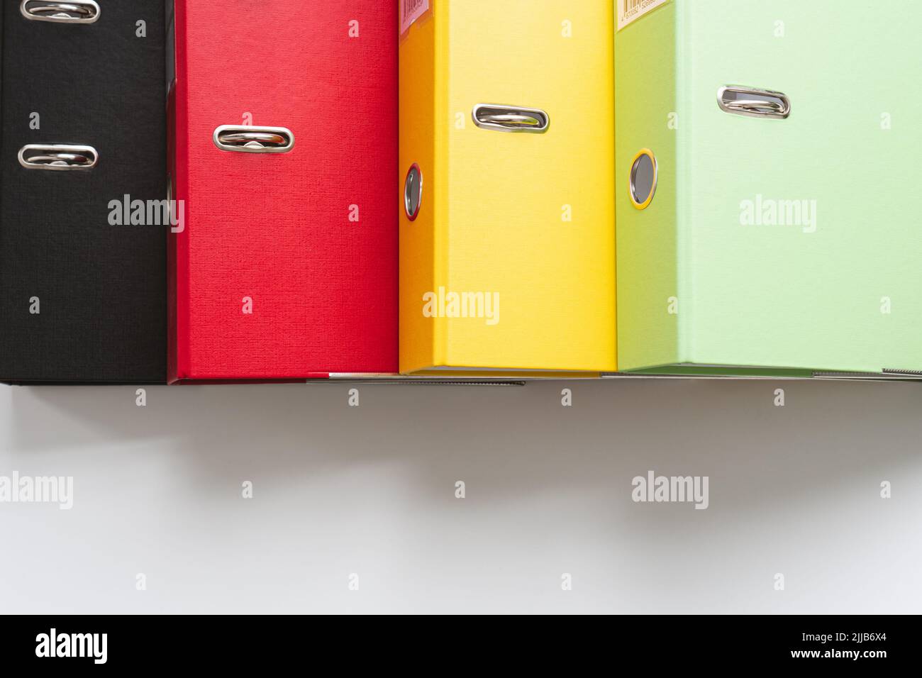 Color office document folders isolated on white background. Top view ...
