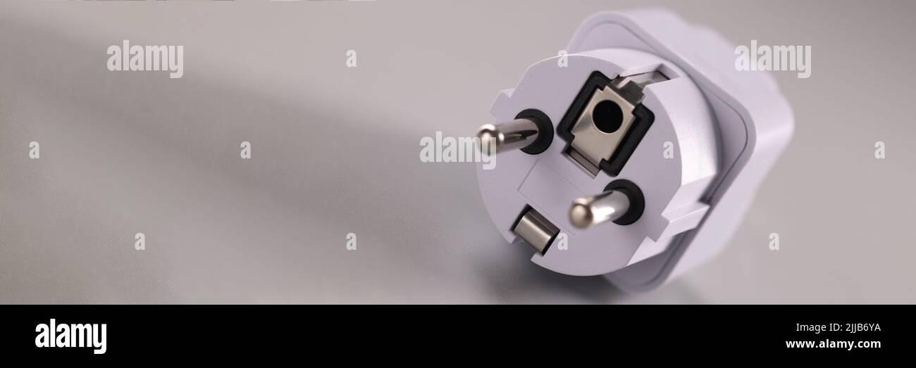 White electrical plug on gray background. Electrical safety Stock Photo ...