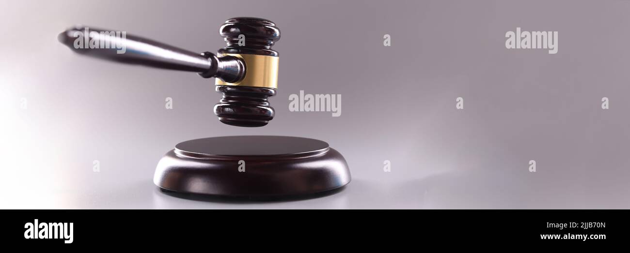Wooden judge gavel on a gray background Stock Photo - Alamy Wooden judge gavel on a gray background Stock Photo - Alamy