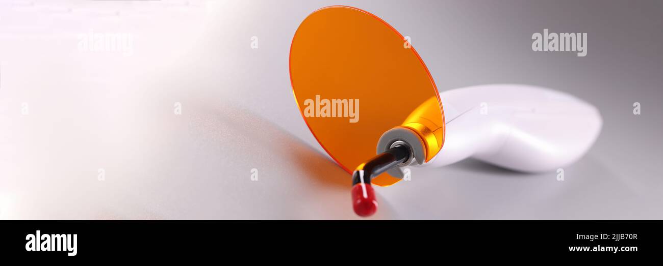 Device for filling and drying teeth closeup Stock Photo - Alamy