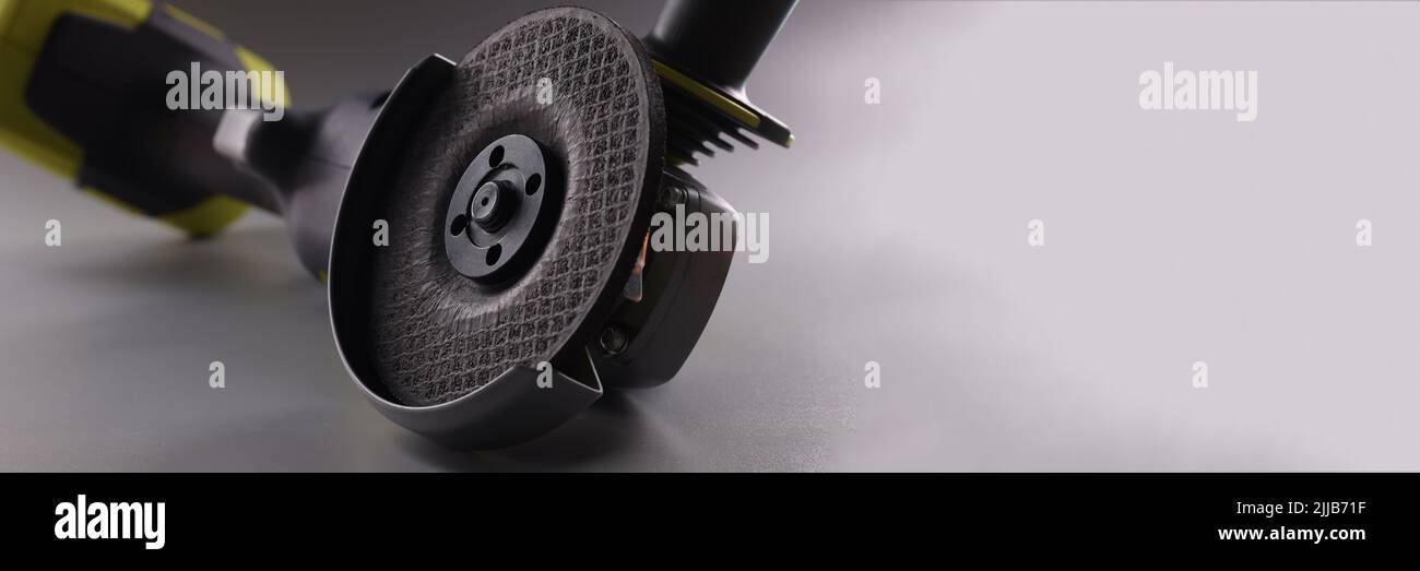 Angle pneumatic grinders grinder with a disc on a gray background Stock ...