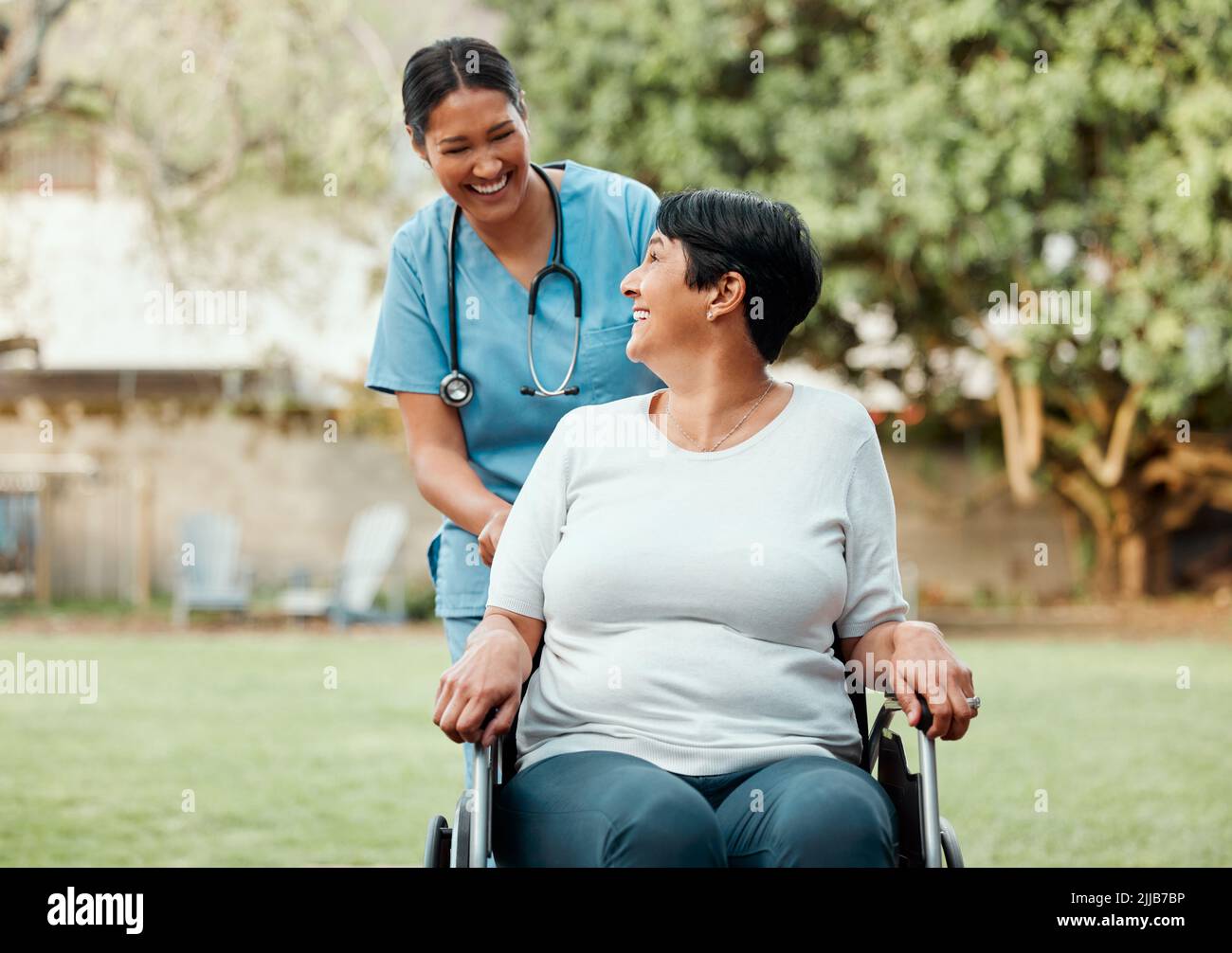 Its an industry of compassion. a young nurse caring for an older woman ...