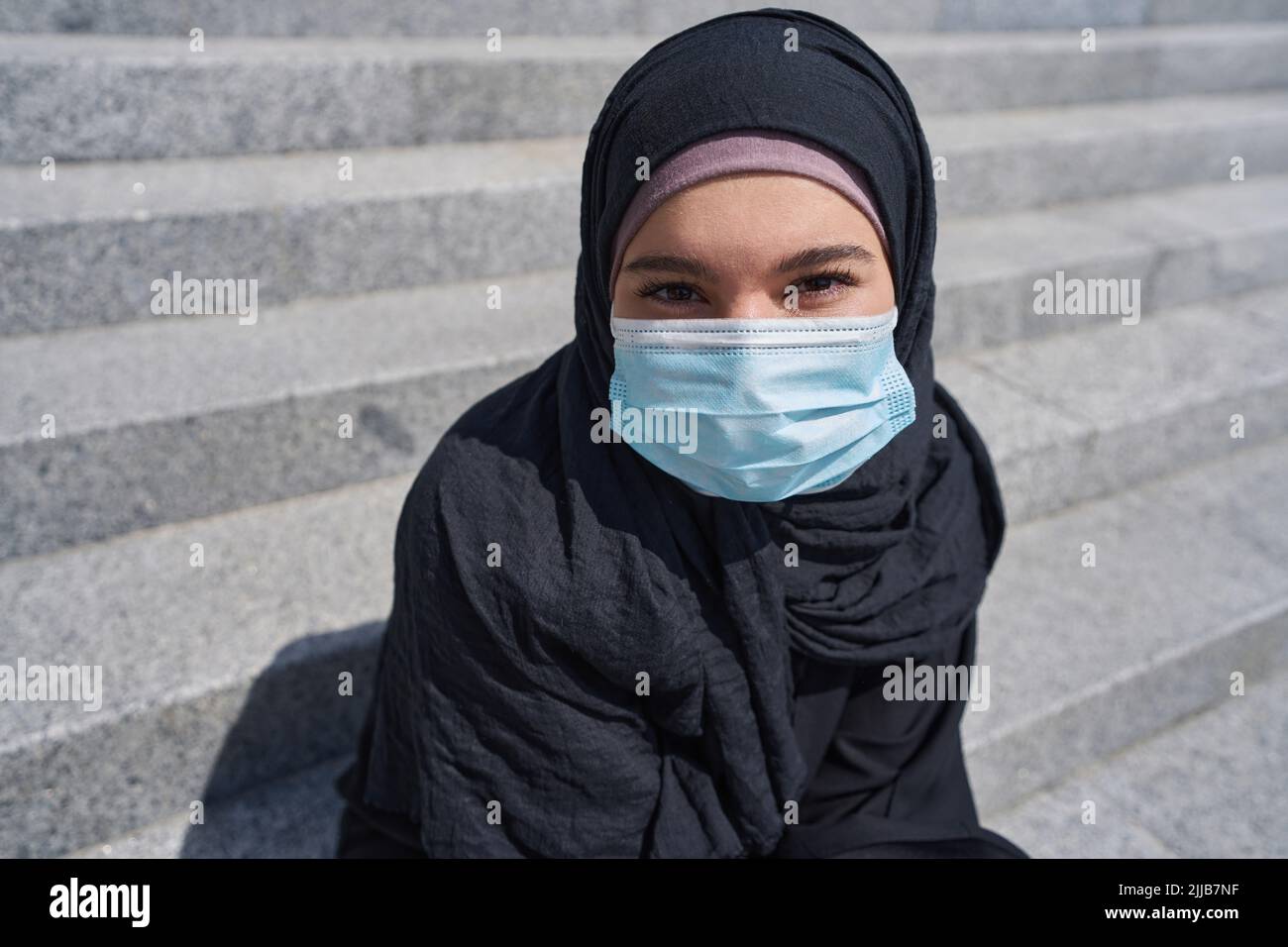 Arabic woman in mask hi-res stock photography and images - Alamy