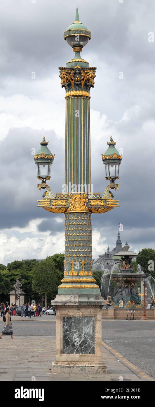Lamp post with decorative lanterns at Place de la Concorde in Paris ...