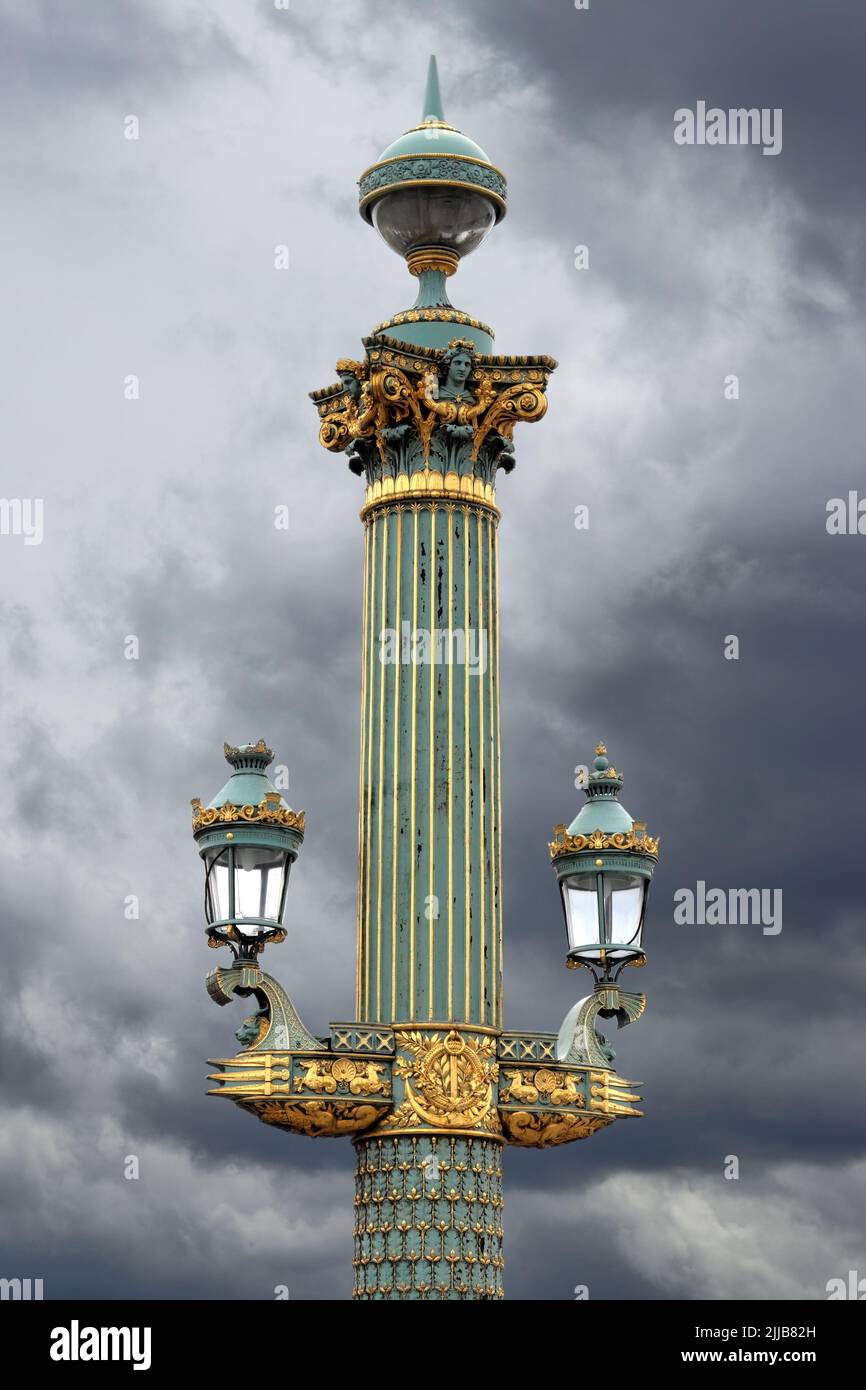 Lamp post with decorative lanterns at Place de la Concorde in Paris ...