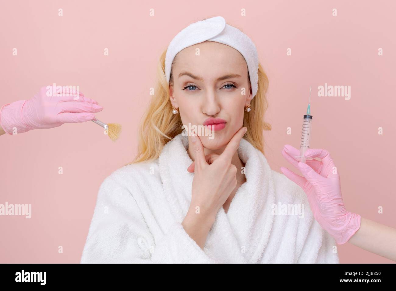 Woman chooses facial care procedure on both sides, gloved hands reach ...