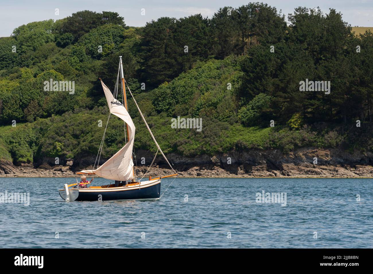Falmouth, Cornwall, England, UK. 2022. Sailing dinghy underway on the ...
