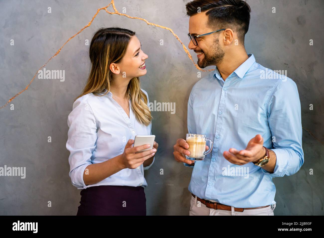 Business colleagues having conversation during coffee break Stock Photo ...