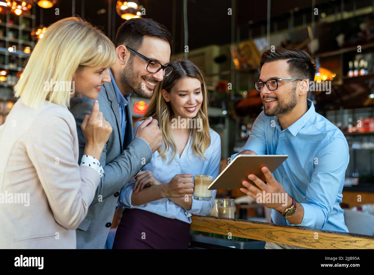 Business people having fun and chatting at workplace office Stock Photo ...