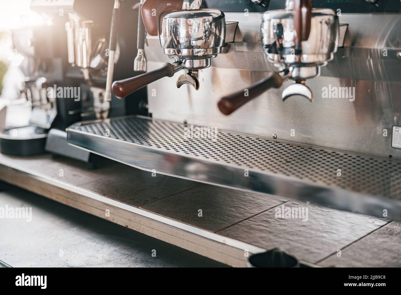 Coffee shop worker professional machine hi-res stock photography and ...