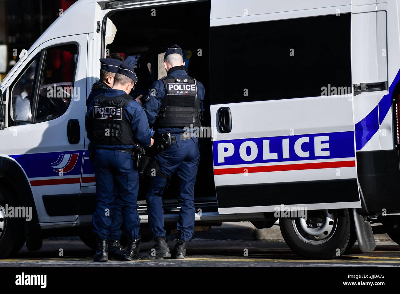 Illustration picture shows a group of police officers near a truck ...