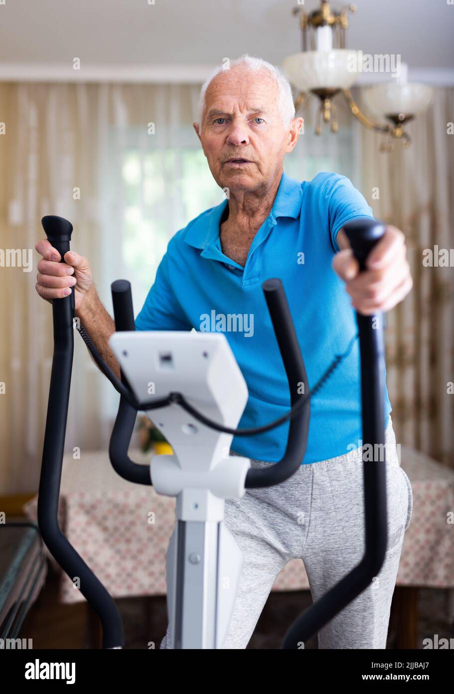 Elderly person exercise machine trainer hi-res stock photography and ...