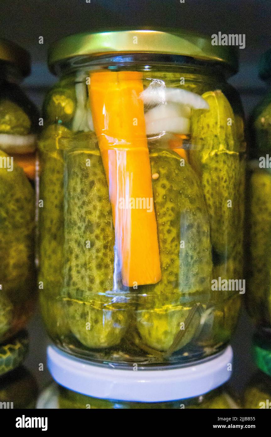 pickled cucumbers in the glass can, green gherkin, pickle, glass jar ...