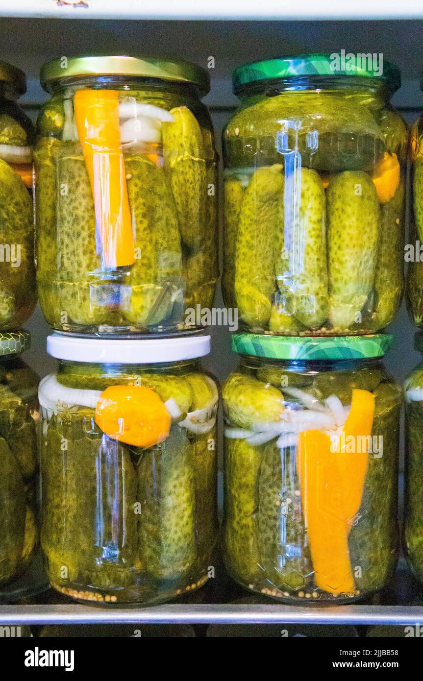 pickled cucumbers in the glass can, green gherkin, pickle, glass jar ...