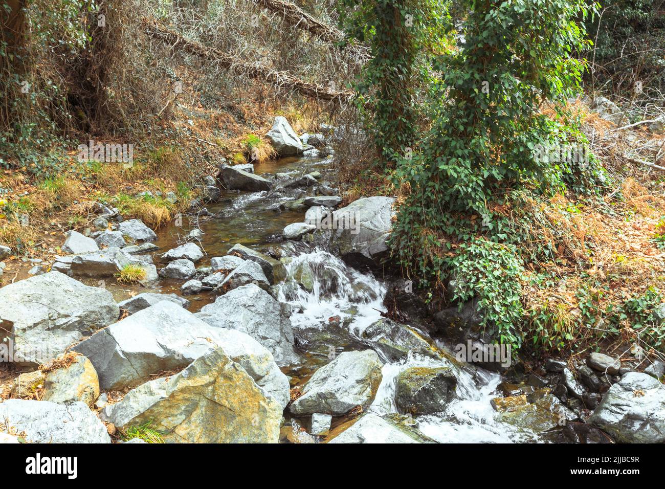 water stream running over rocks Stock Photo - Alamy