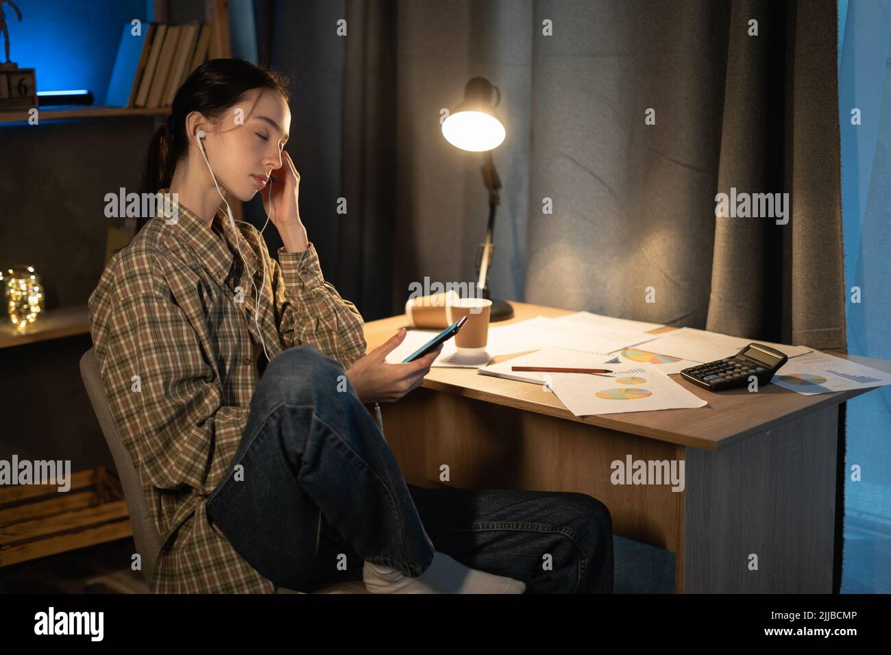 teenager girl listening music while sitting at a desk Stock Photo - Alamy teenager girl listening music while sitting at a desk Stock Photo - Alamy