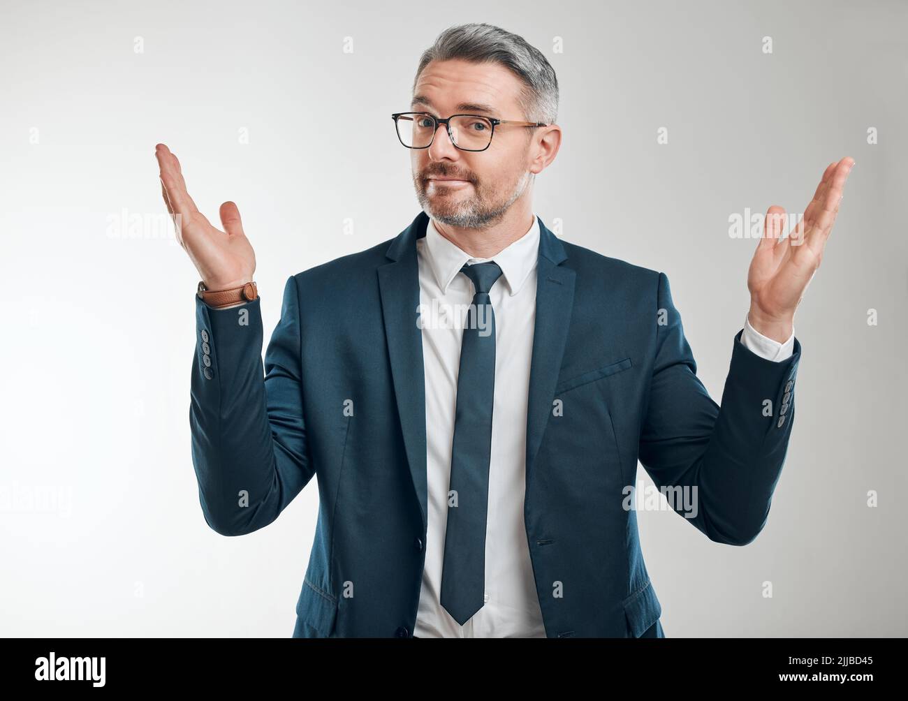 Ill leave it to you to make a decision. Studio portrait of a mature ...