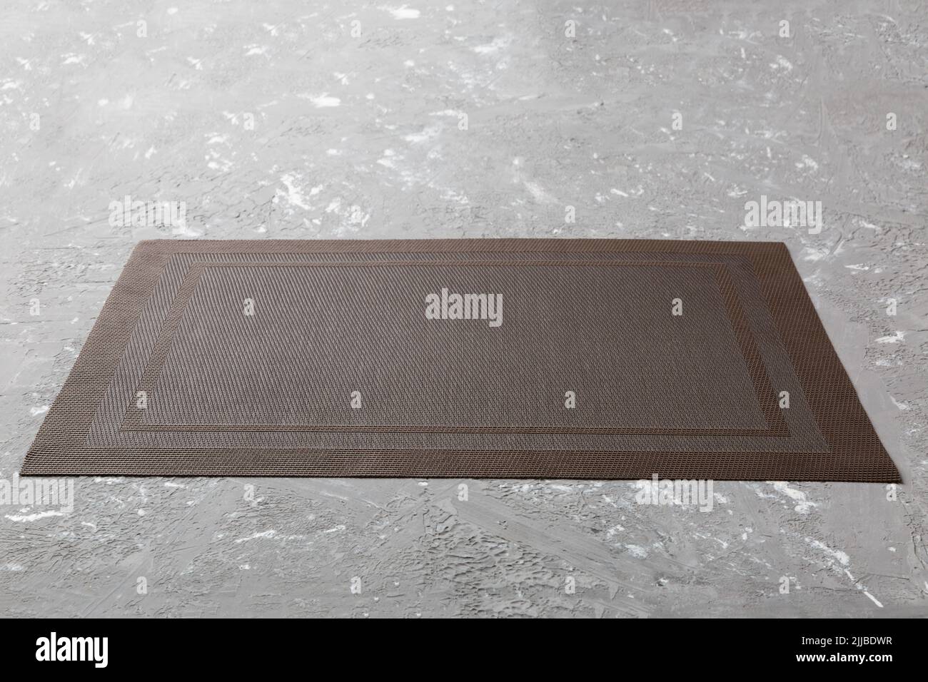 Perspective view of grey tablecloth for food on cement background ...