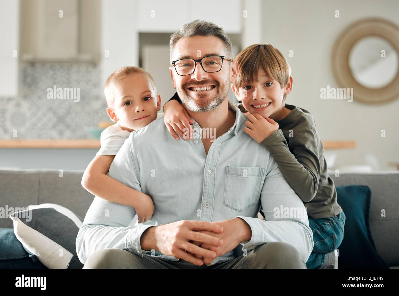 Theyre my biggest joy. a family relaxing together at home Stock Photo ...
