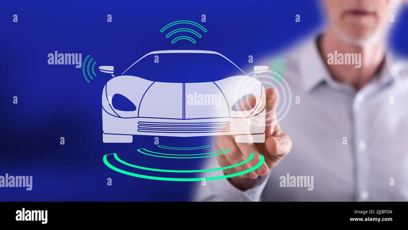Man touching a smart car concept on a touch screen with his finger ...