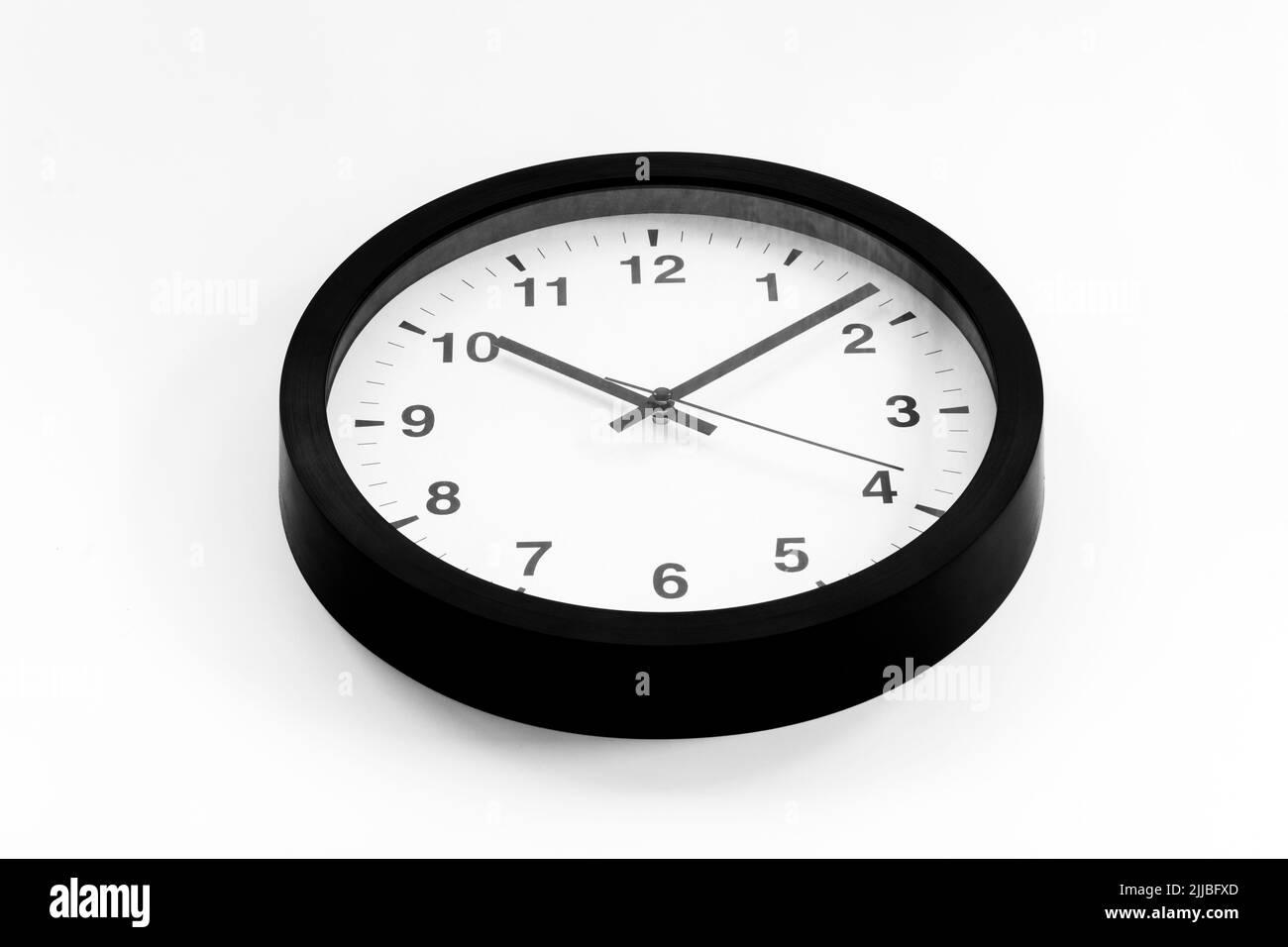 Office wall clock. Black and white clock - time to work concept Stock Photo - Alamy