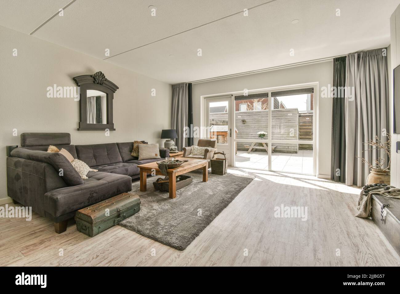 Cozy interior design of living room furnished with comfortable couch ...