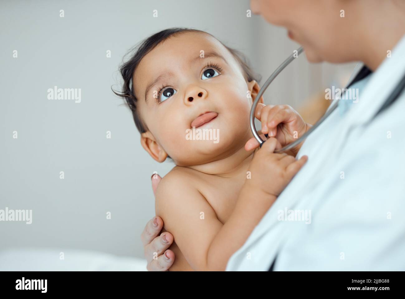 Evaluating babys physical and mental development. a paediatrician ...