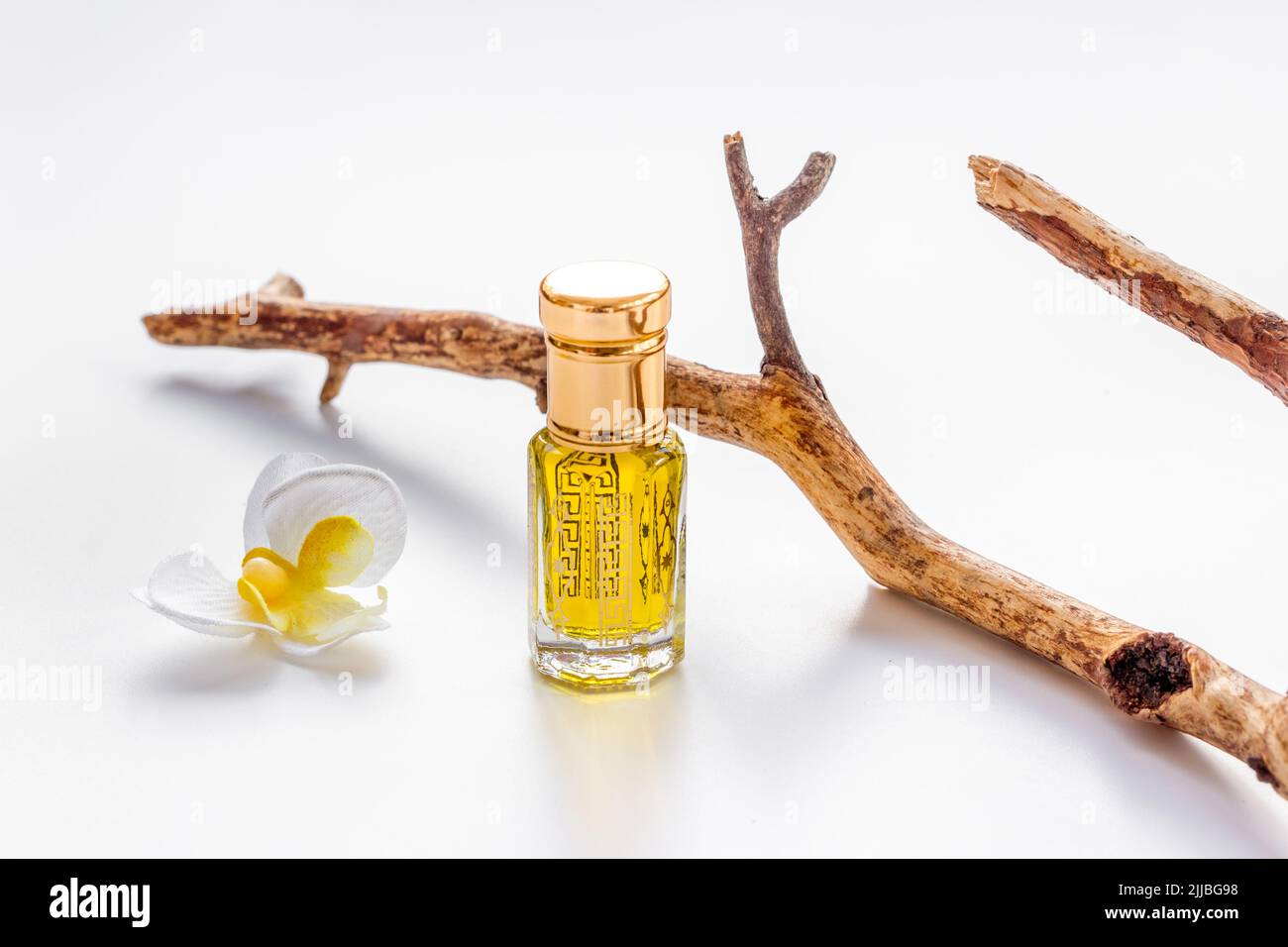 Arabic perfume Oud oil in glass bottle, close up. Aromatic Arabian oil ...