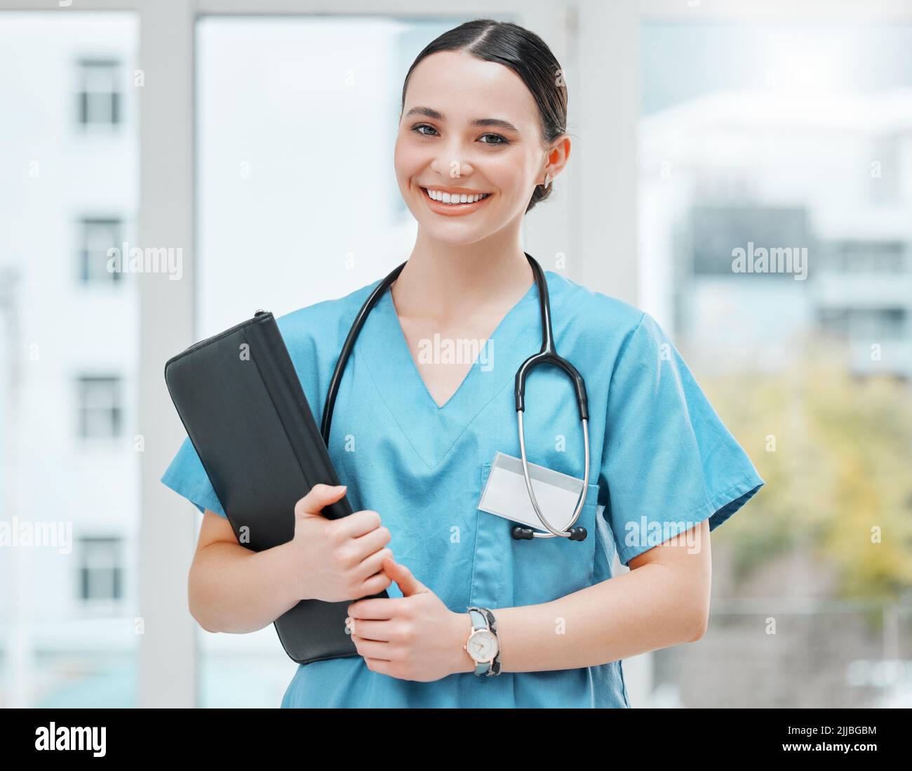 Doing my daily rounds. a young female doctor working in a hospital ...