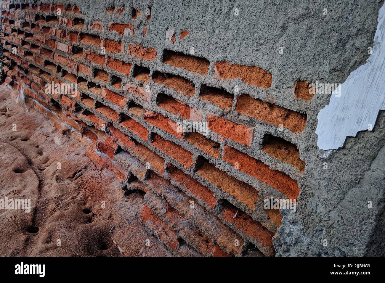 bricks that are decades old with crushed and melted conditions Stock ...