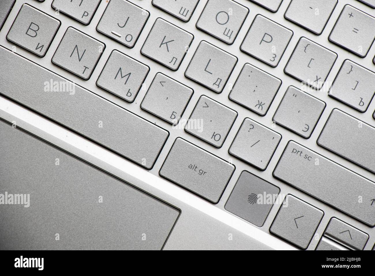 Laptop and notebook computer keyboard close-up, texts, keys and gray ...
