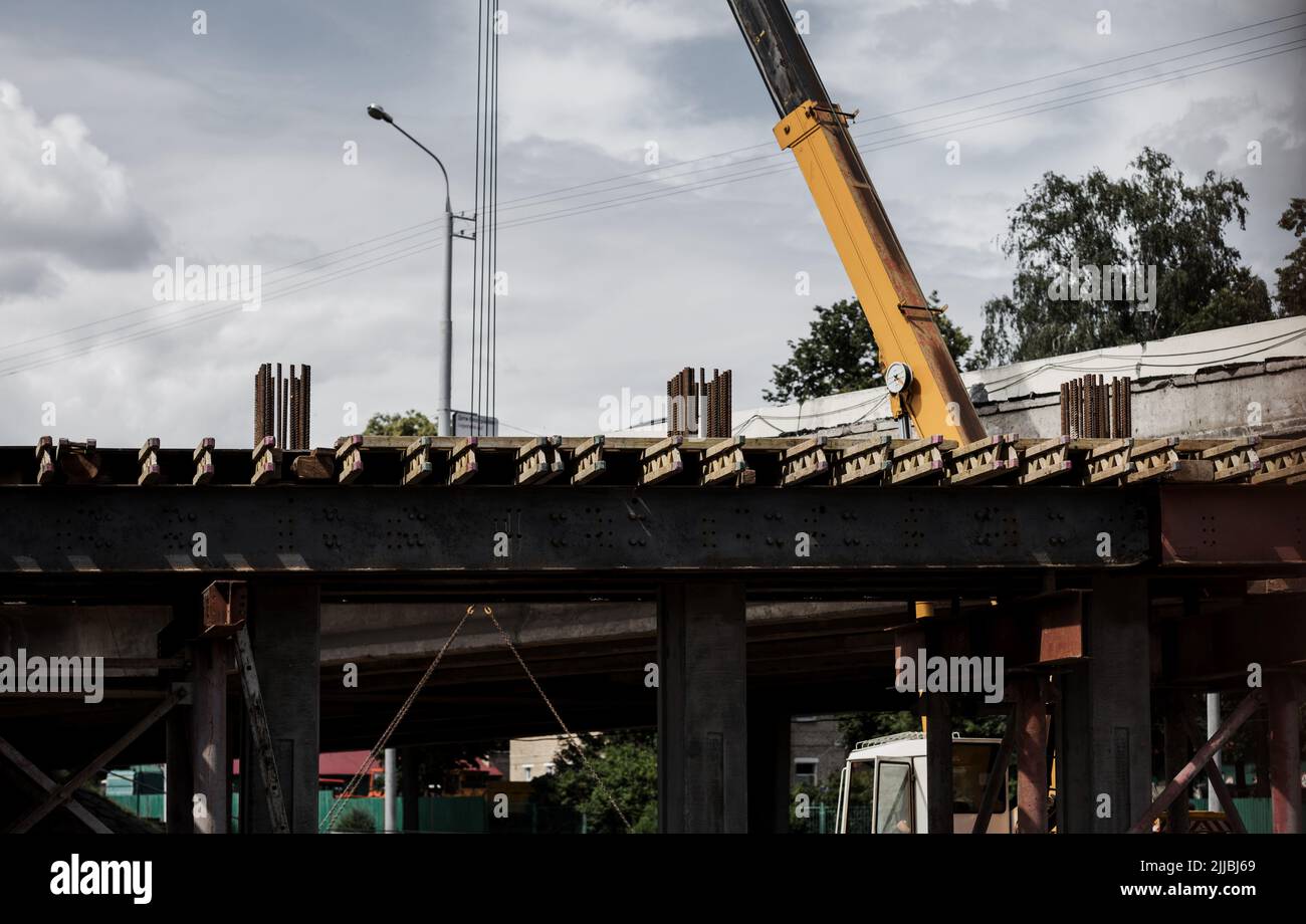 repair of an automobile bridge. Construction work to replace the bridge ...