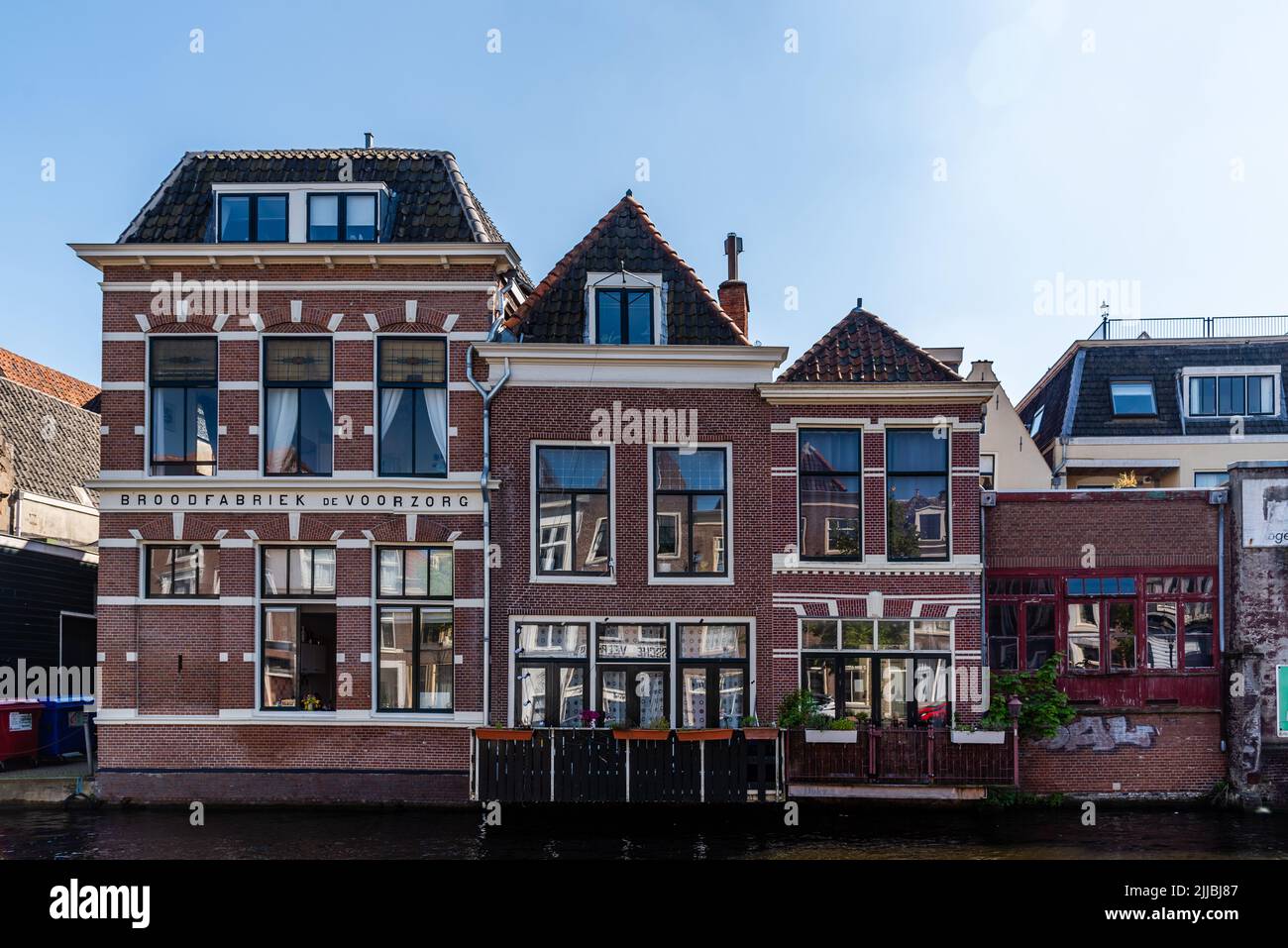 Leiden, Netherlands - May 6, 2022: Old houses by the canal in the old ...