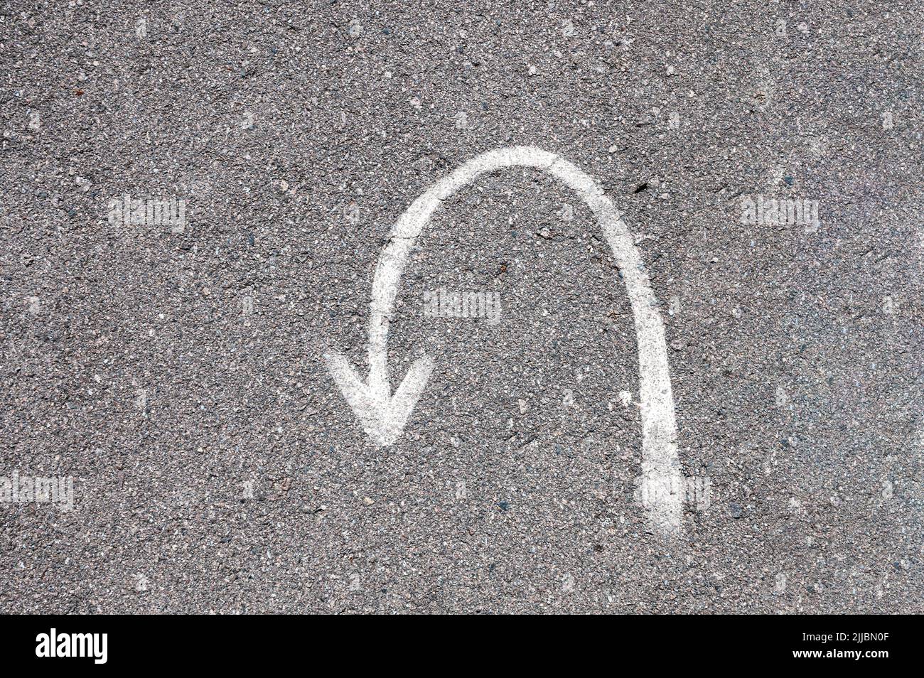 Turning sign on road. Turn back asphalt road texture background. Go ...