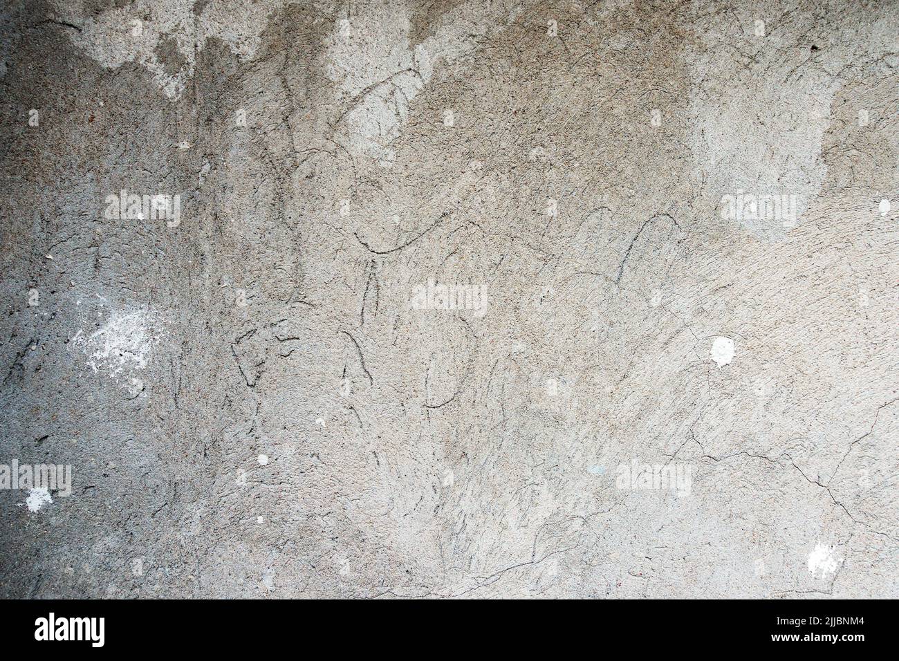 Dark plaster wall with dirty cracked scratched background. Old retro ...