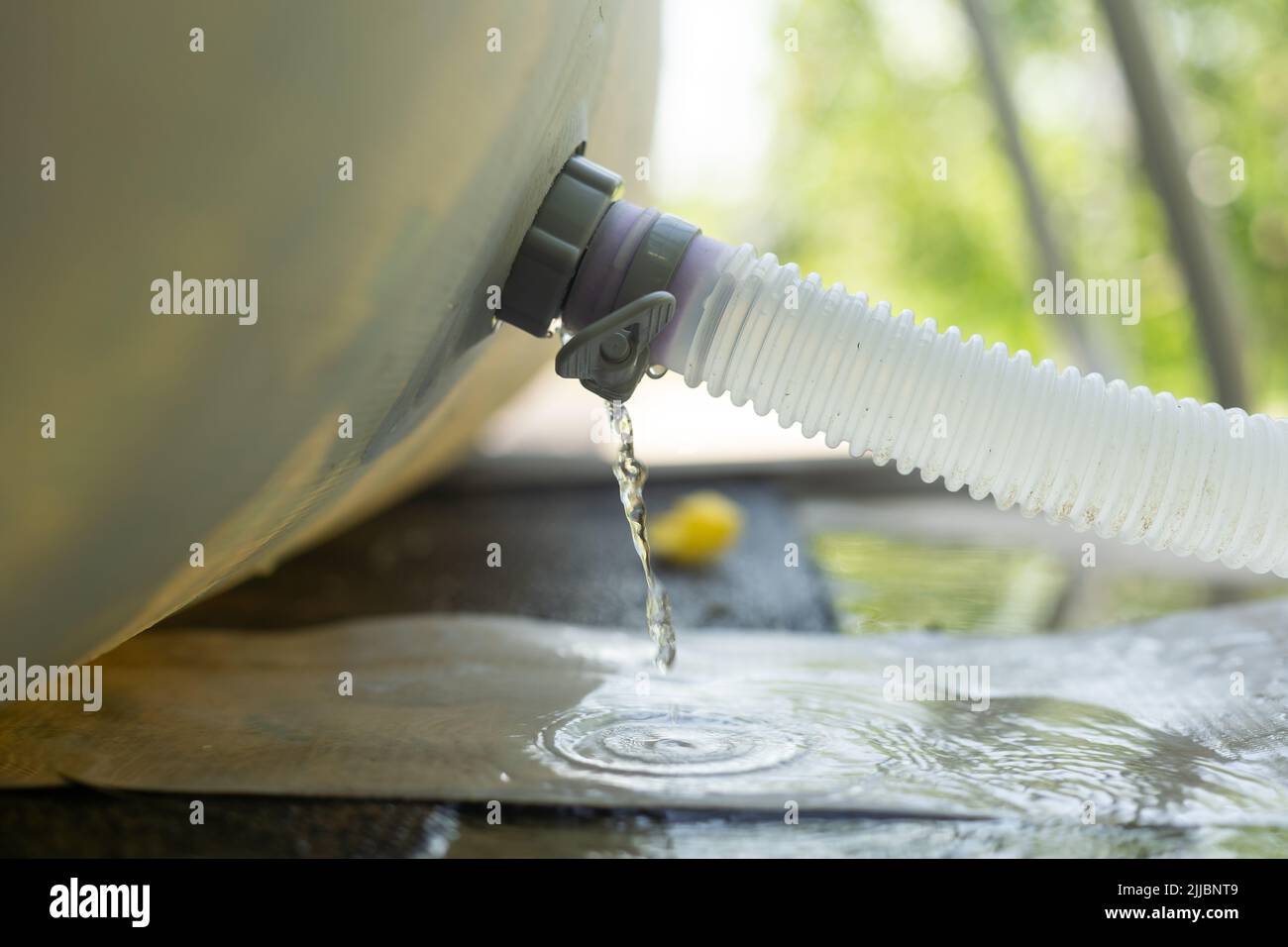 Blue plastic hose for cleaning a swimming pool, Close-up Stock Photo ...