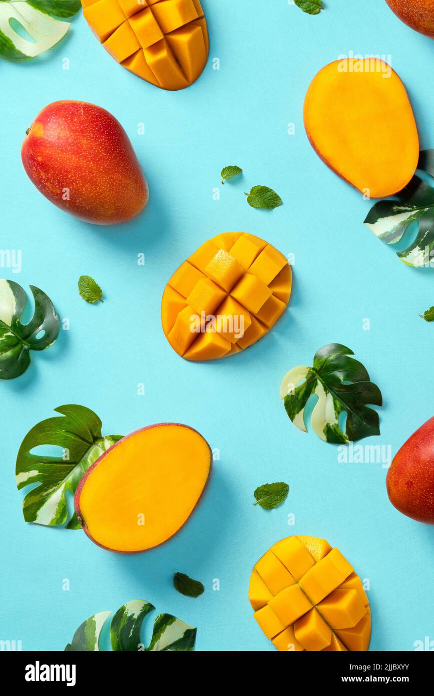 Mango background design concept. Top view of diced fresh mango fruit ...