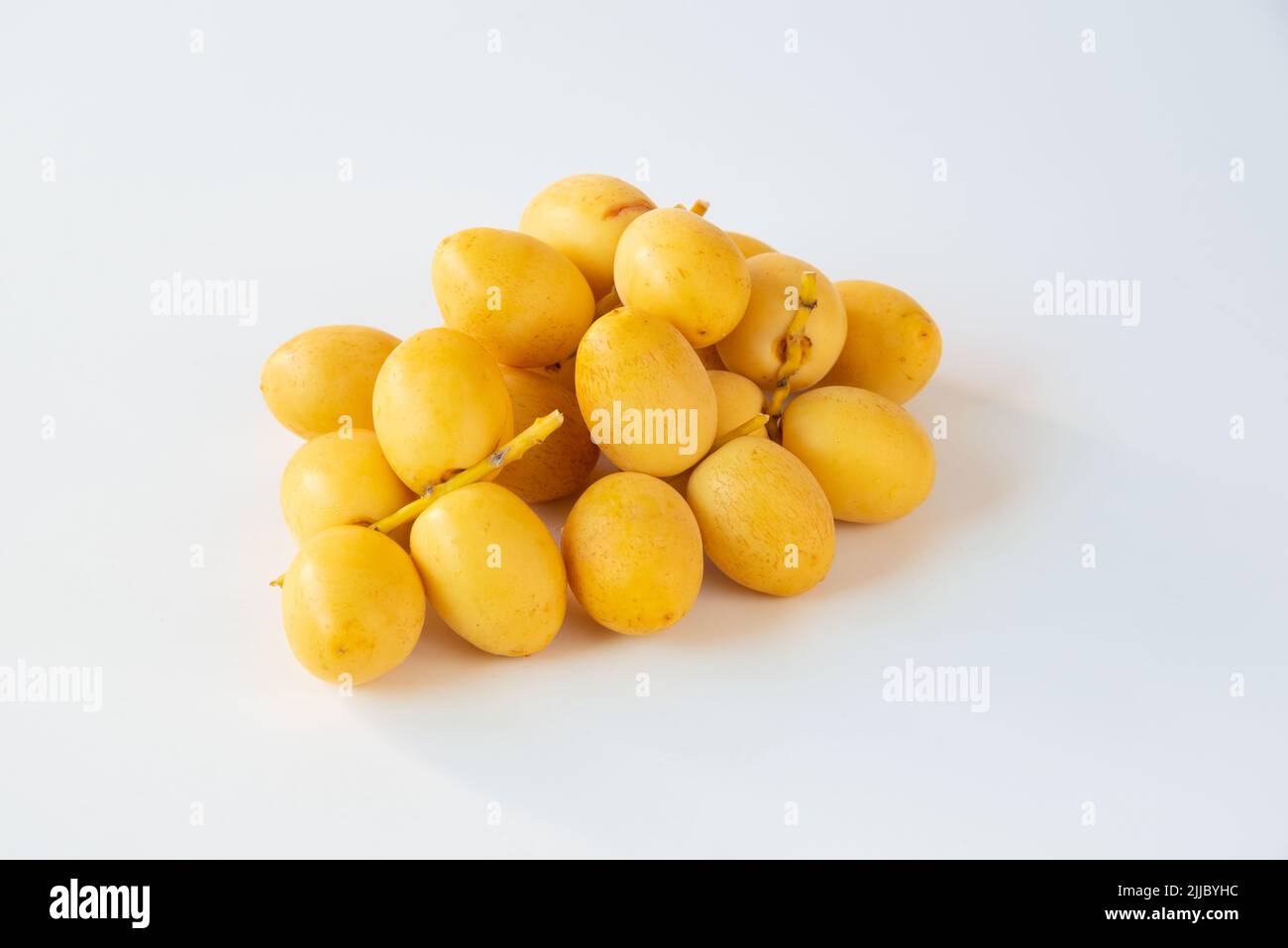Delicious fresh date palm fruit on white background Stock Photo - Alamy
