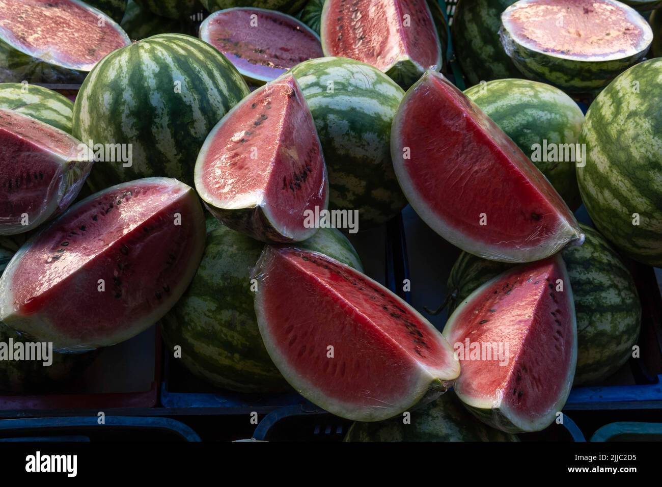 Sale of watermelons exposed in the street. Refreshing summer fruit ...