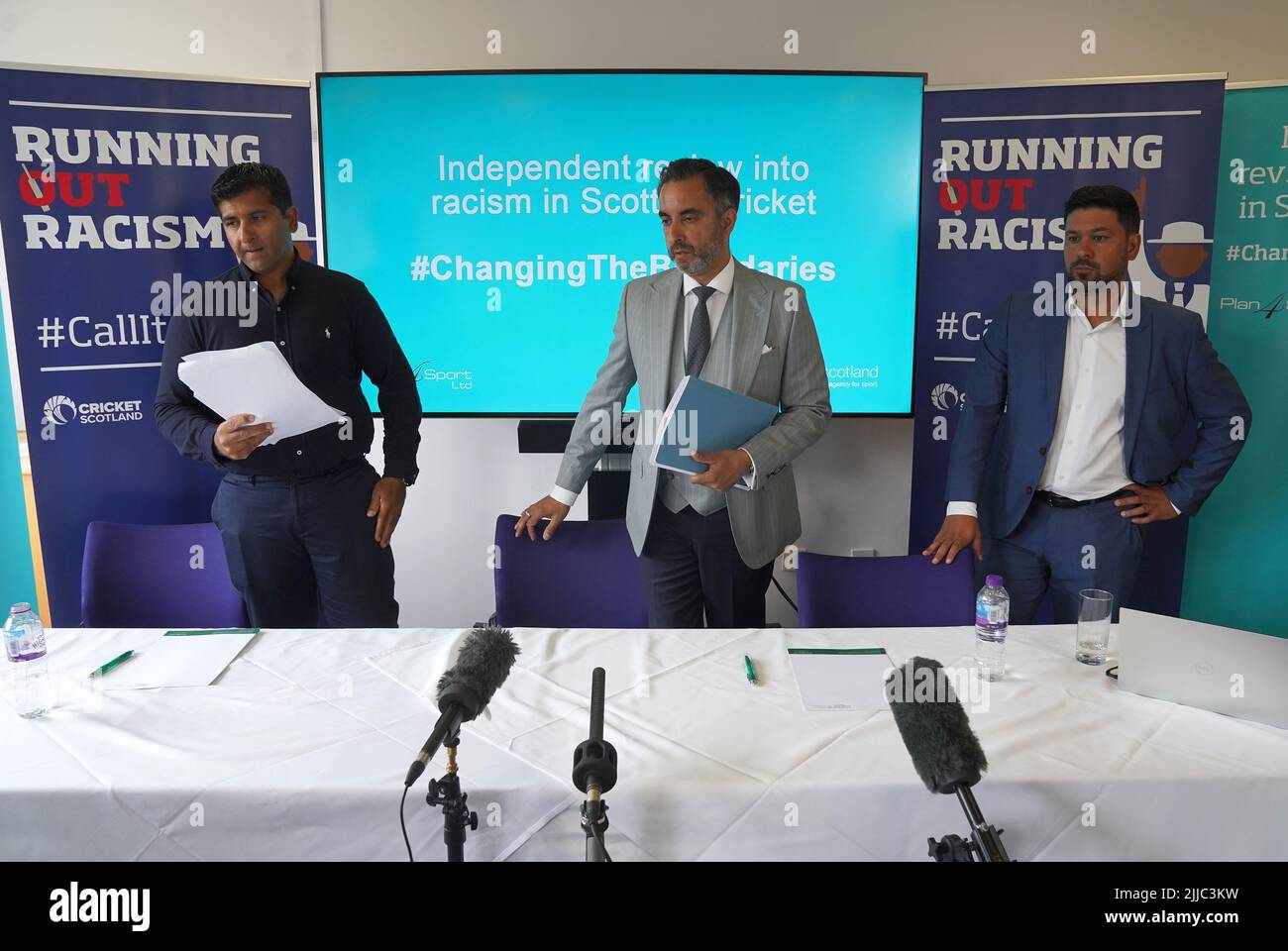 Majid Haq, Aamer Anwar and Qasim Sheikh (left-right) arrive for a press ...