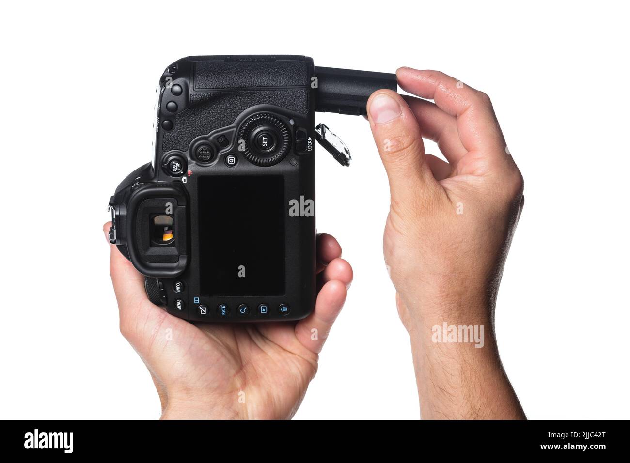 Photo camera in hand isolated on white background Stock Photo - Alamy